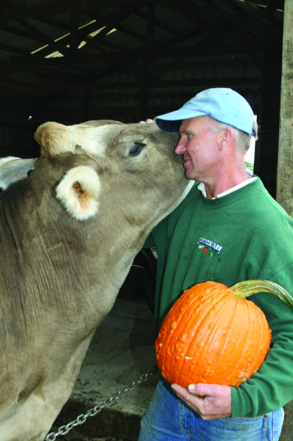 Tom Hugging Cow - Wisconsin Farm Bureau Federation